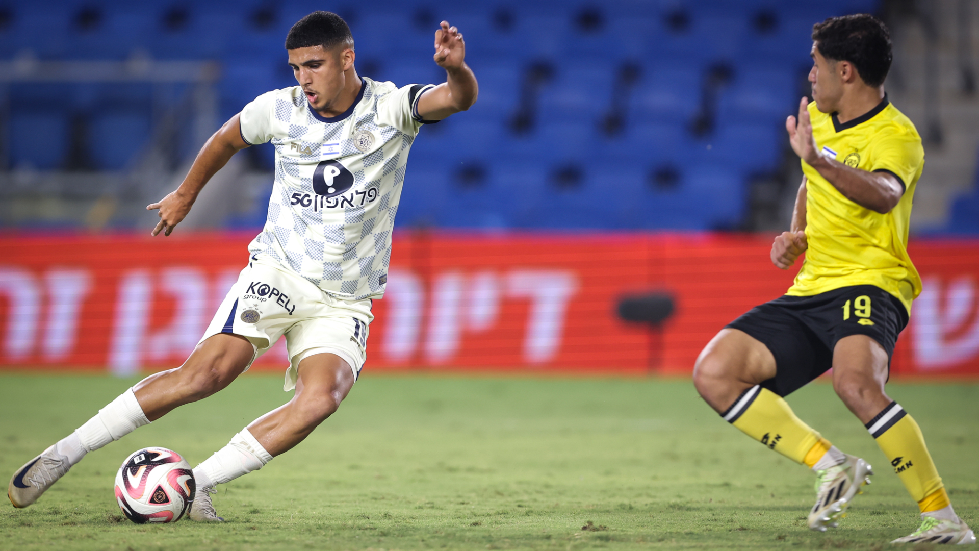 Madmon after his dramatic winning goal - Maccabi Tel Aviv Football Club